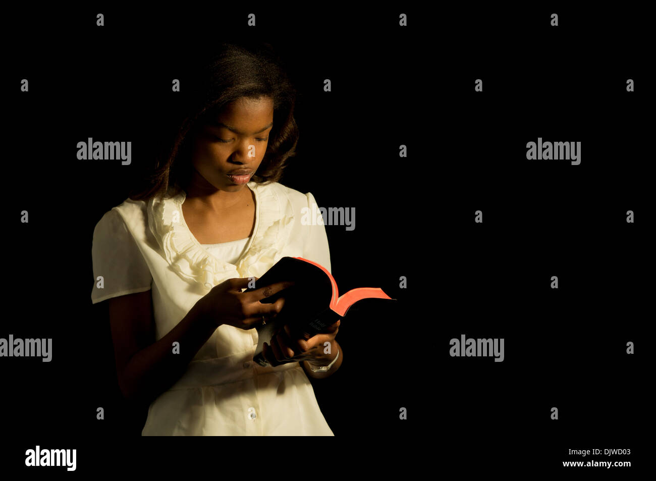 African american child reading bible hi-res stock photography and ...