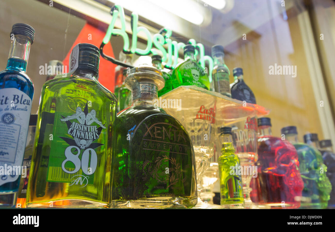 Colourful Absinthe bottles in a shop window Absinthe in the historic ...
