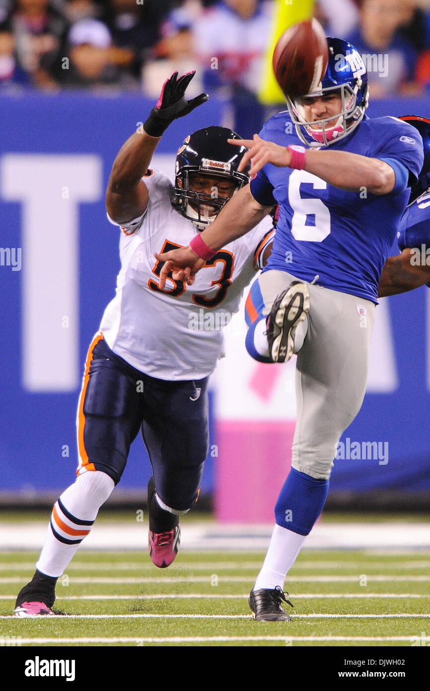 After mishandling a snap New York Giants punter Matt Dodge (6) recovers ...