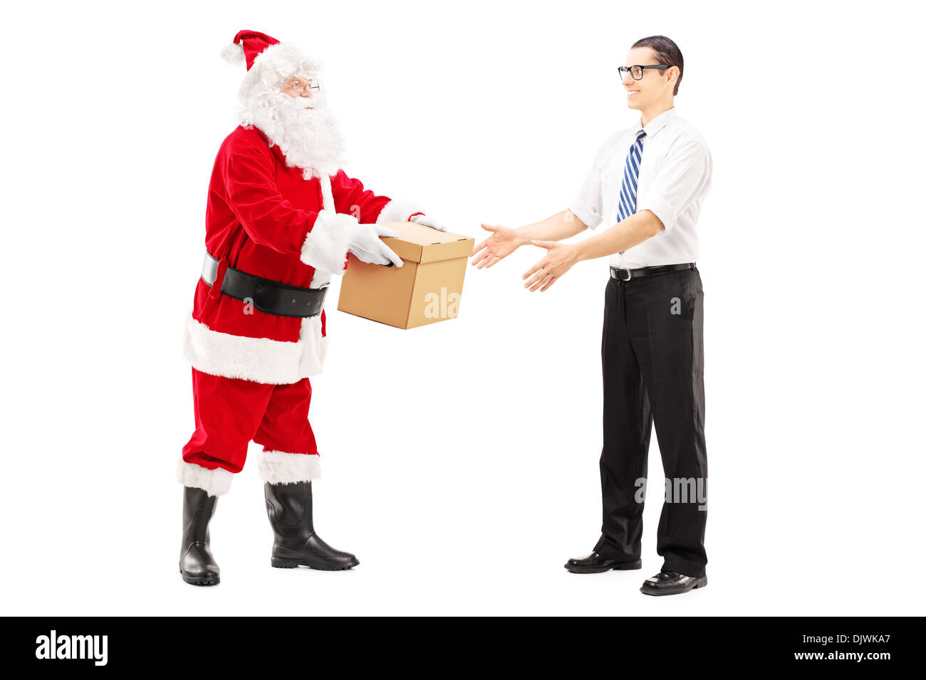 Full length portrait of a Santa Claus giving a box to a young male ...