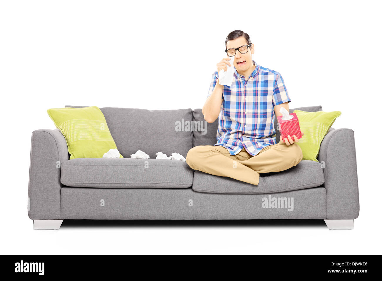 Sad man sitting on couch Cut Out Stock Images & Pictures - Alamy