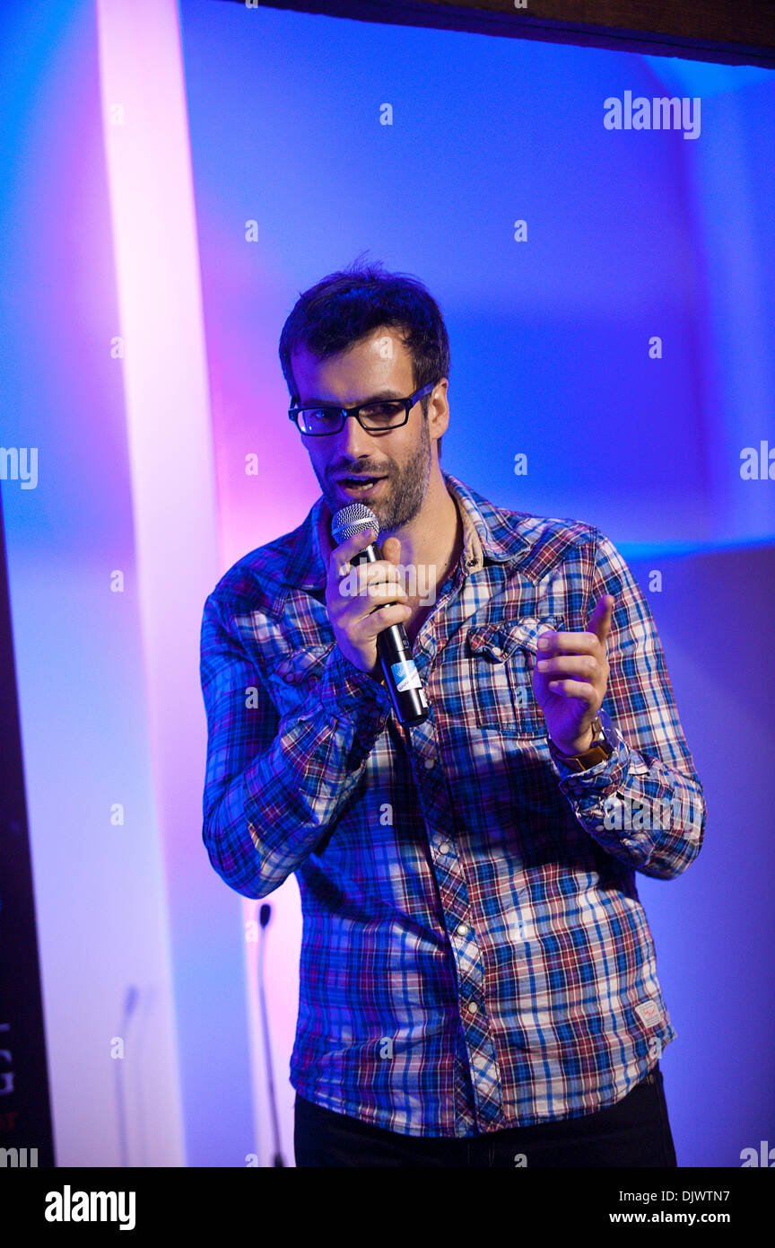 Hay-on-Wye, UK. 30th November 2013. Comedian Marcus Brigstock gives a ...