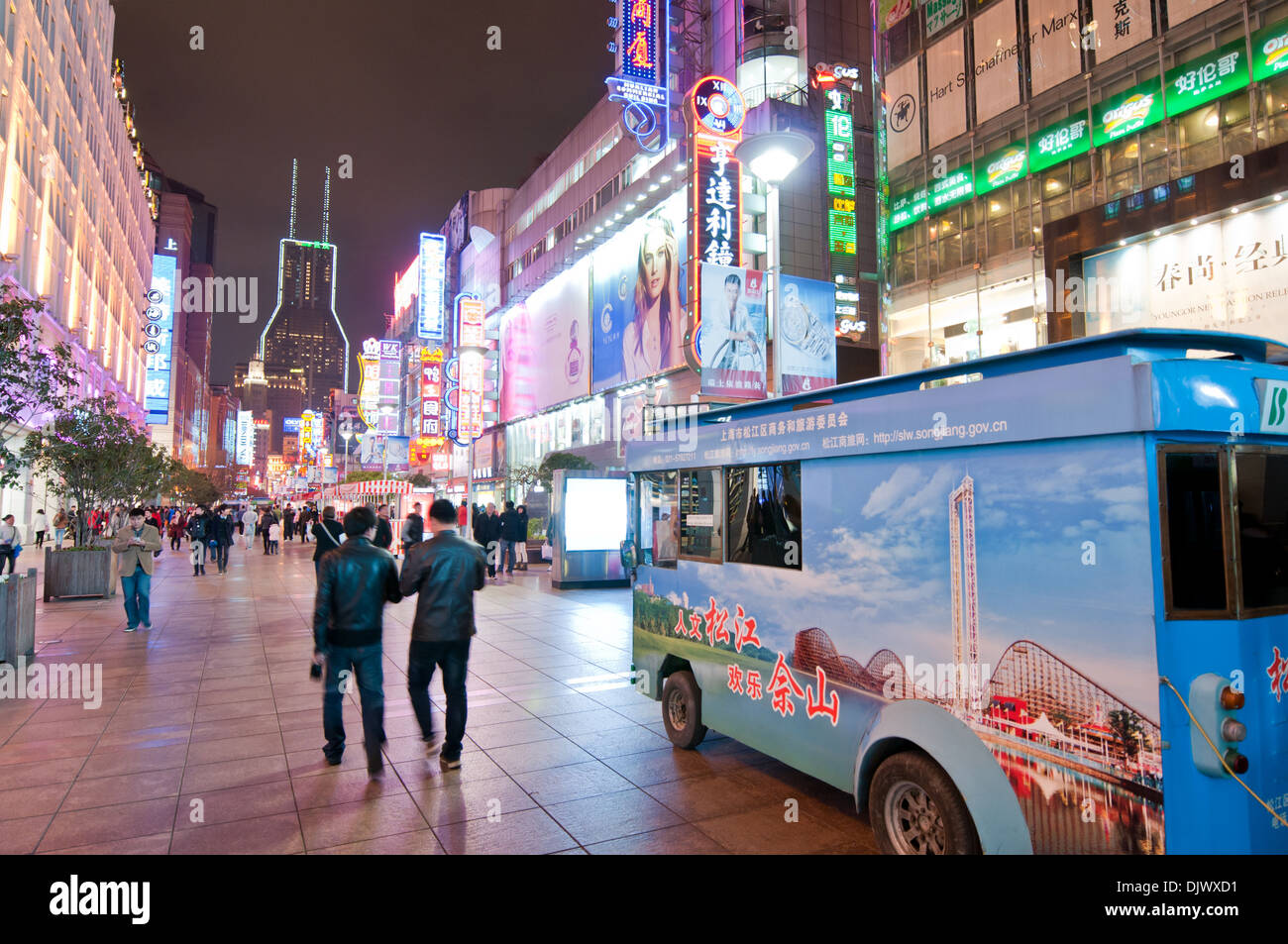 Tourist small tram at Nanjing Road pedestrian street - main shopping ...
