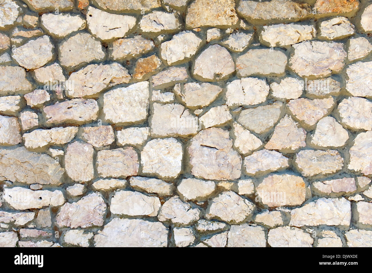 Wall made of stones Stock Photo - Alamy