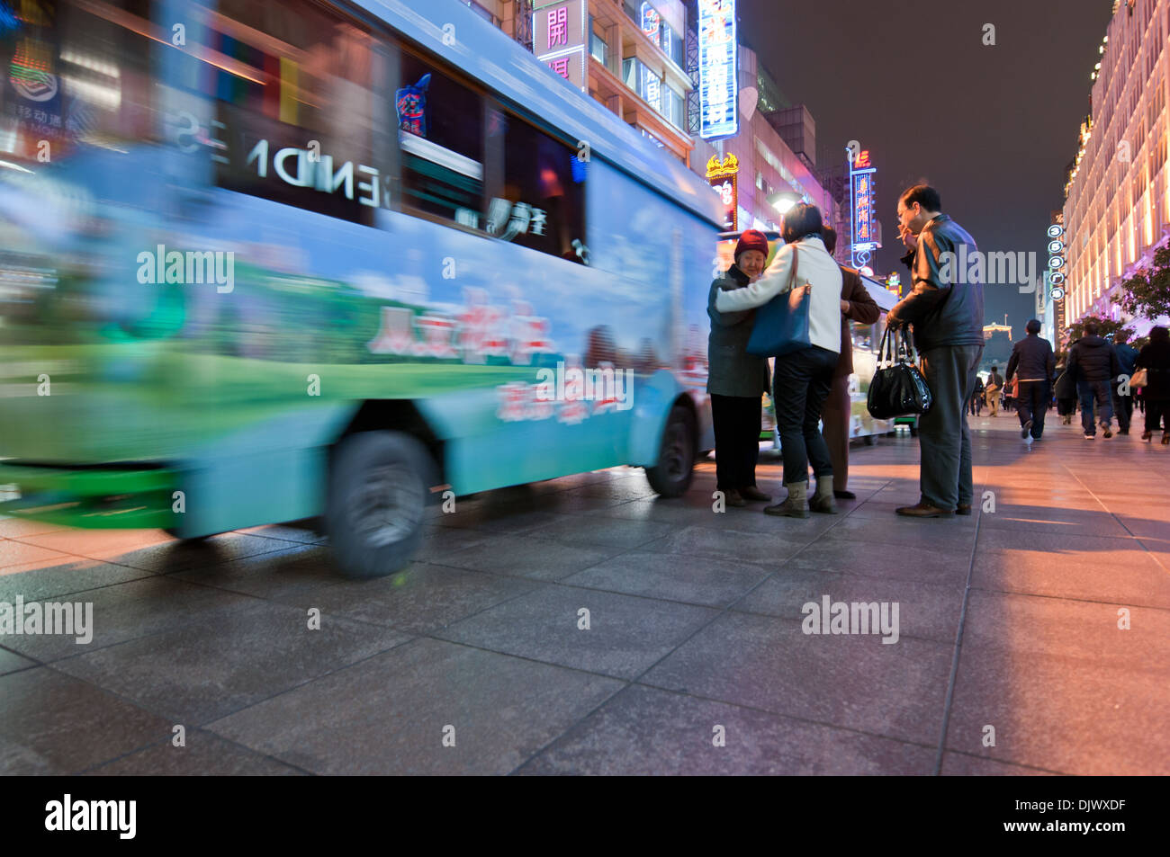 Tourist small tram at Nanjing Road pedestrian street - main shopping ...