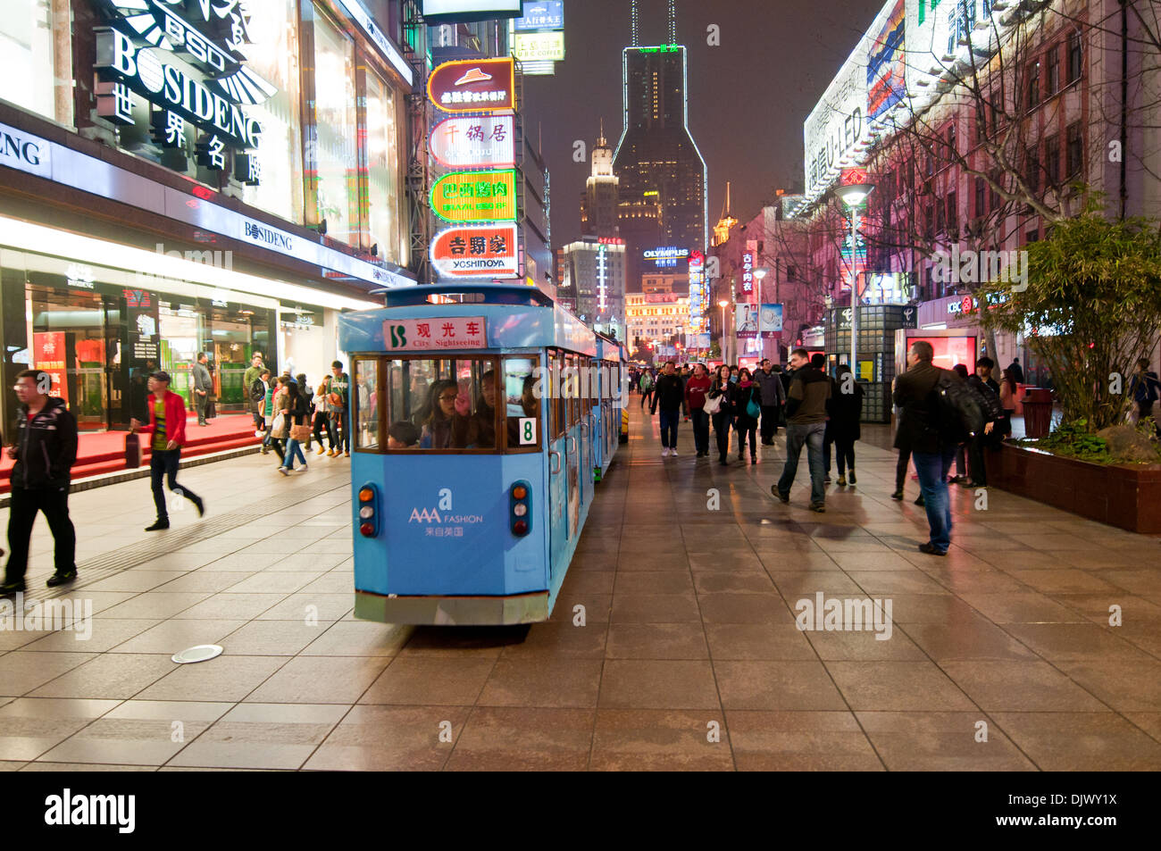 Tourist small tram at Nanjing Road pedestrian street - main shopping ...