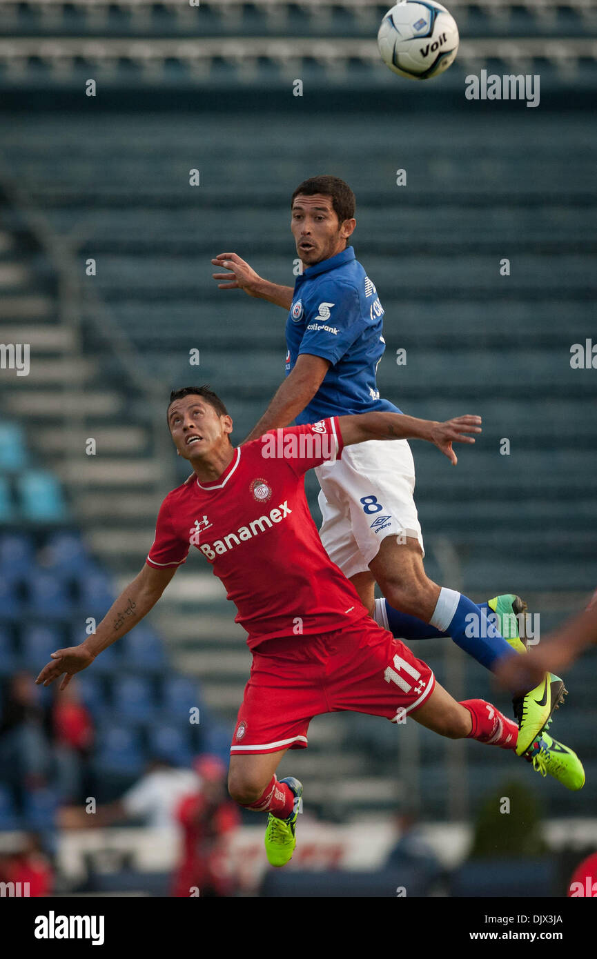 Mexico City, Mexico. 30th Nov 2013. Cruz Azul's Israel Castro (R) vies ...