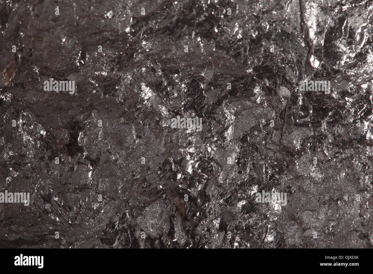 Black hard bituminous coal, carbon nugget closeup macro texture ...