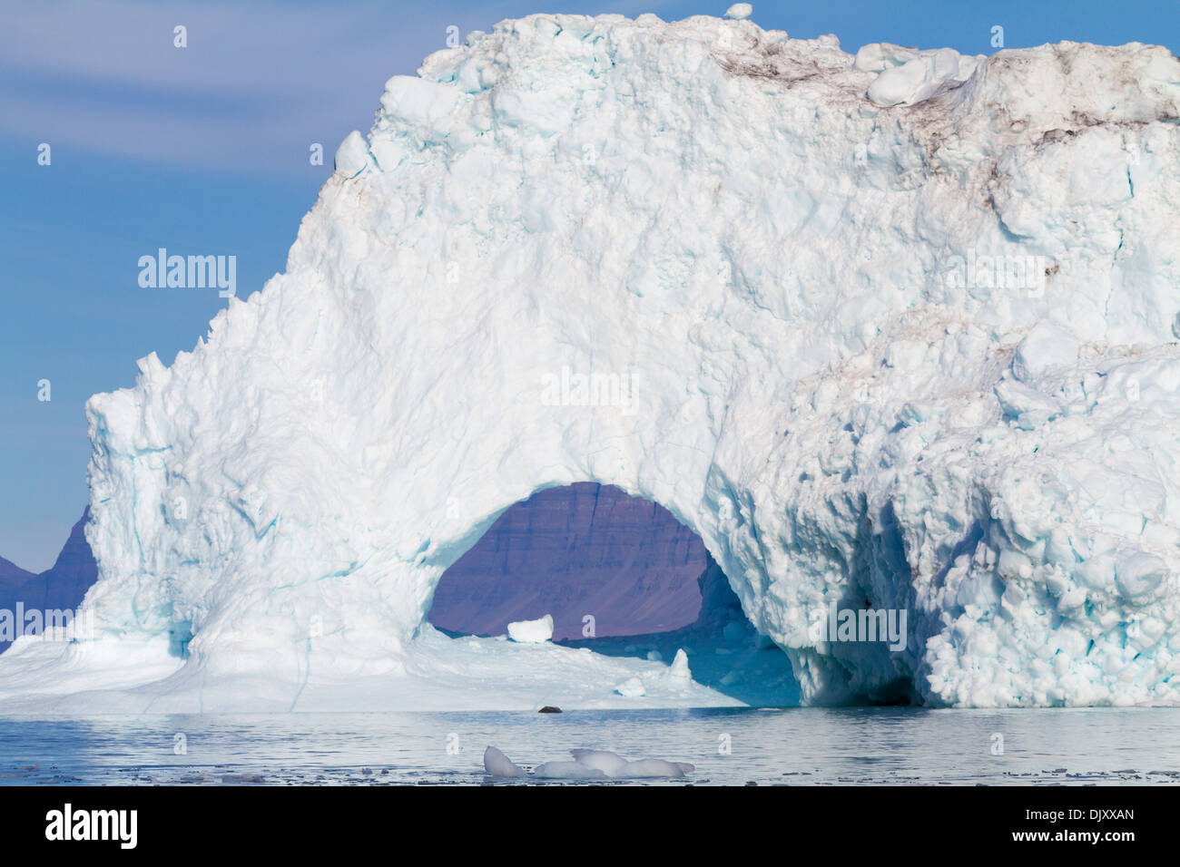 Ice arch on huge iceberg, Fohnfjord, Greenland Stock Photo - Alamy