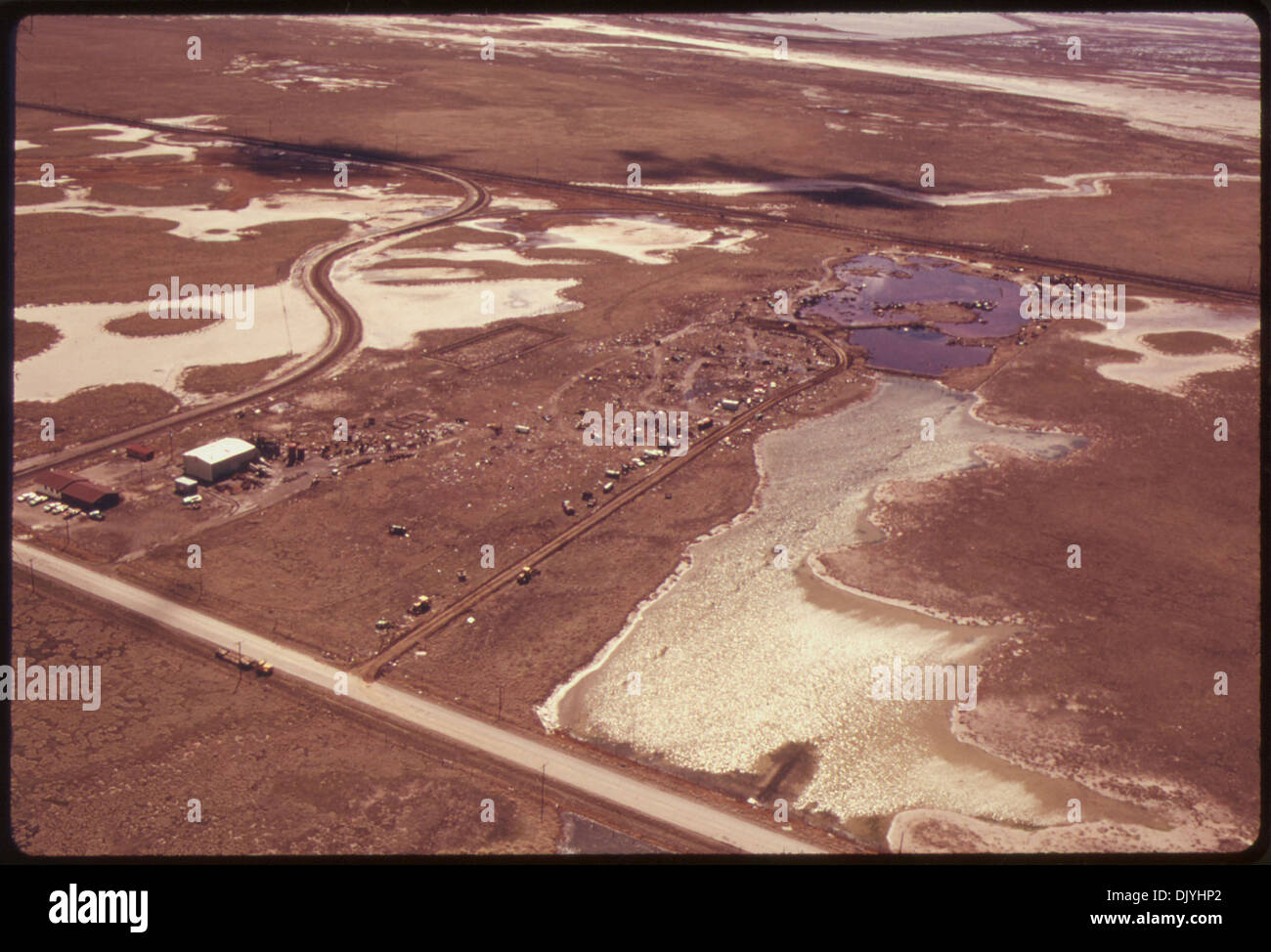 An aerial view of a five-acre pond near Ogden, Utah, contaminated with ...