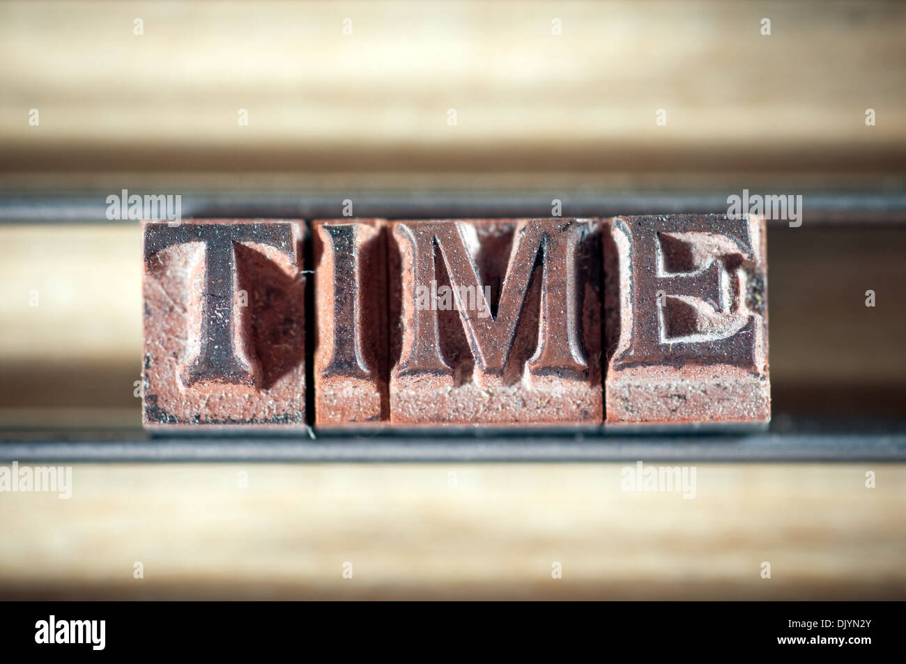 The word time in block letters hi-res stock photography and images - Alamy
