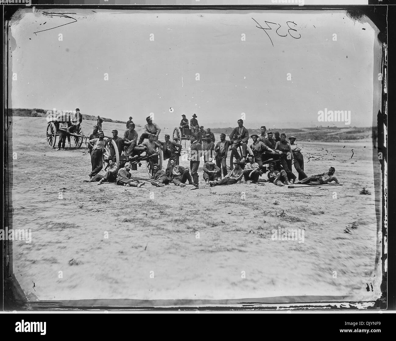 A photograph of a military battery at rest, showing equipment and ...