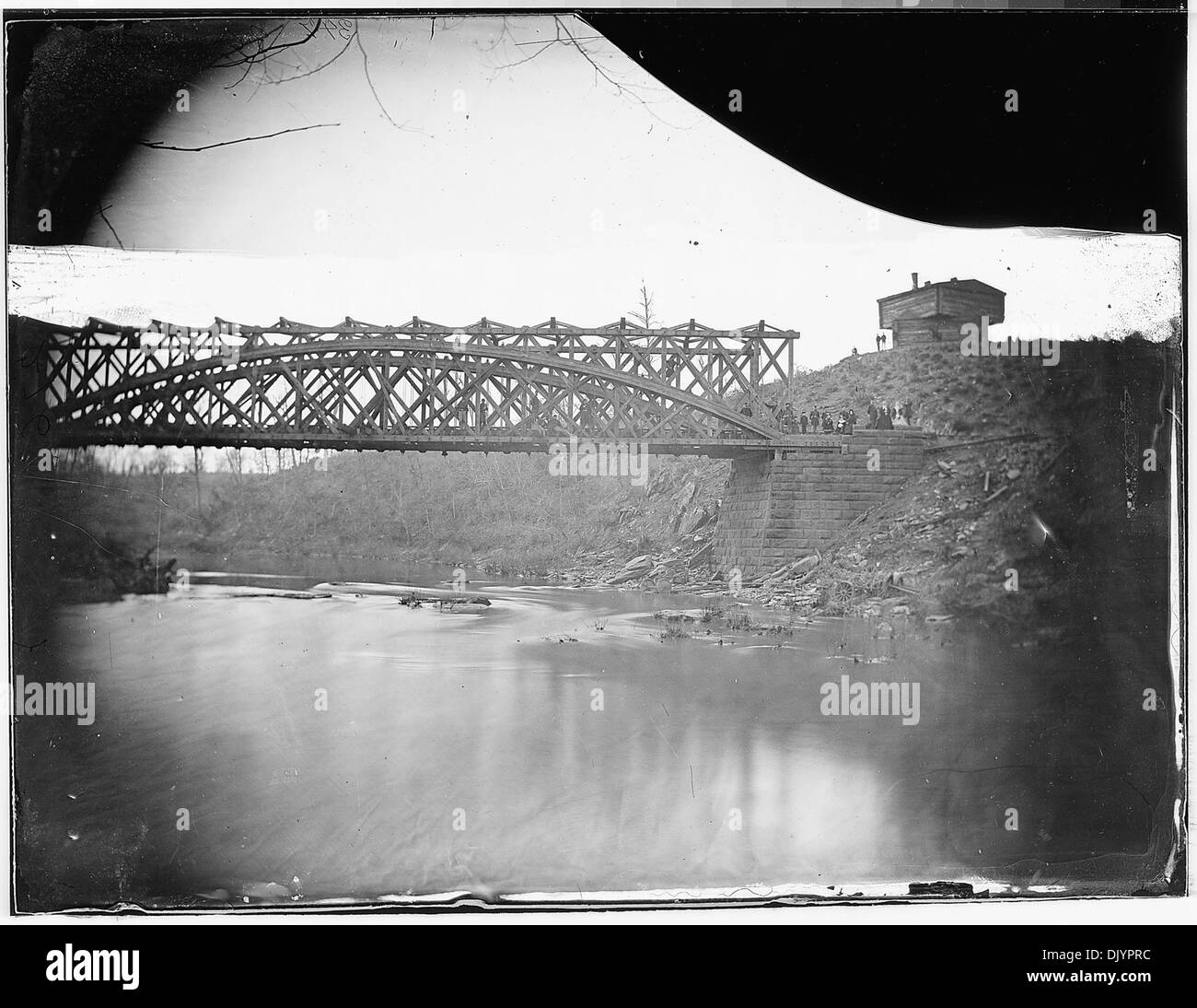 A bridge and blockhouse constructed by U.S. engineers, likely for ...