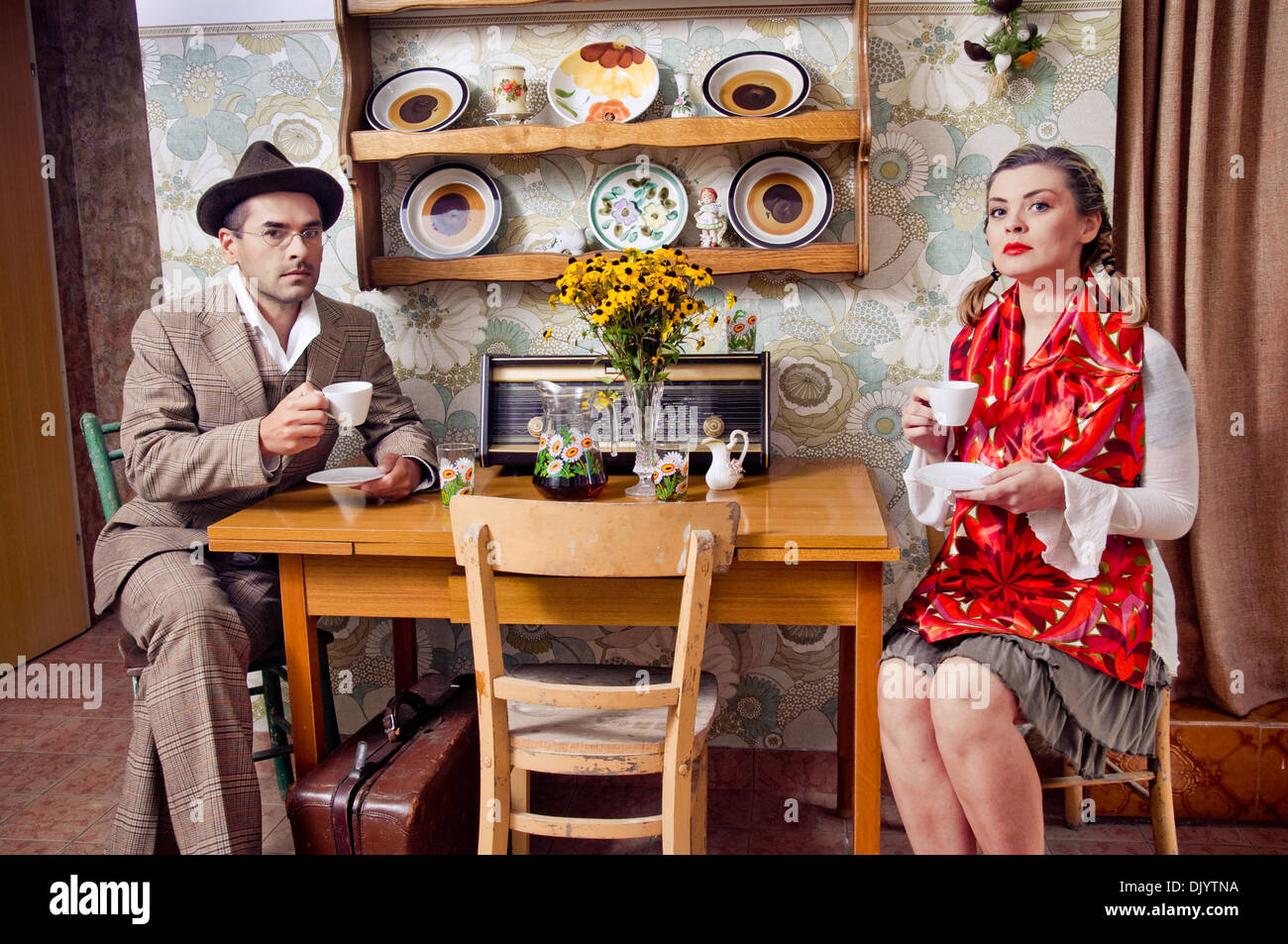 Retro couple drinking coffee or tea Stock Photo - Alamy