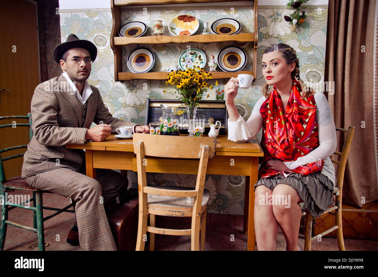 Retro couple drinking coffee or tea Stock Photo - Alamy