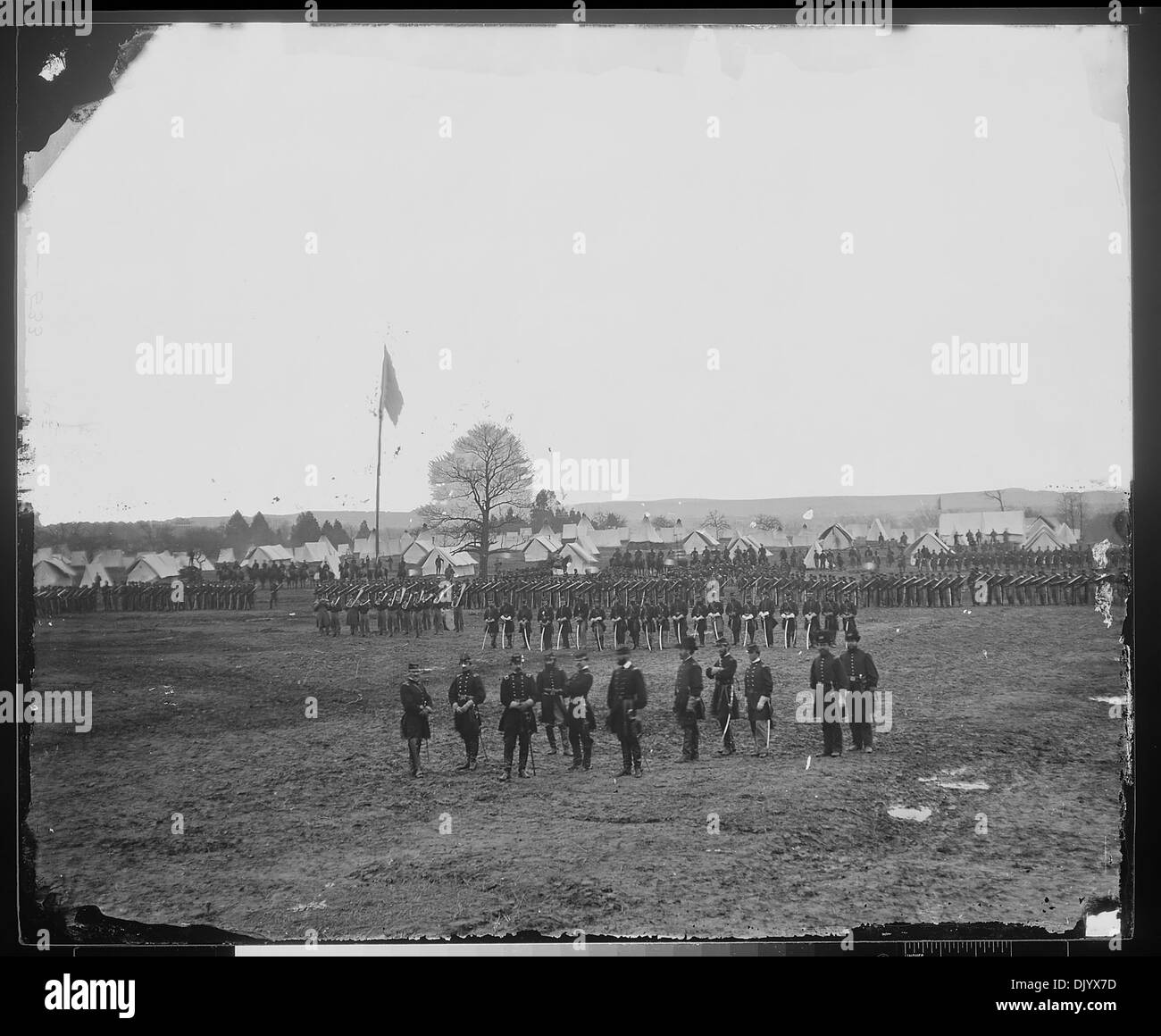 This photograph shows a camp scene featuring soldiers from the 7th New ...