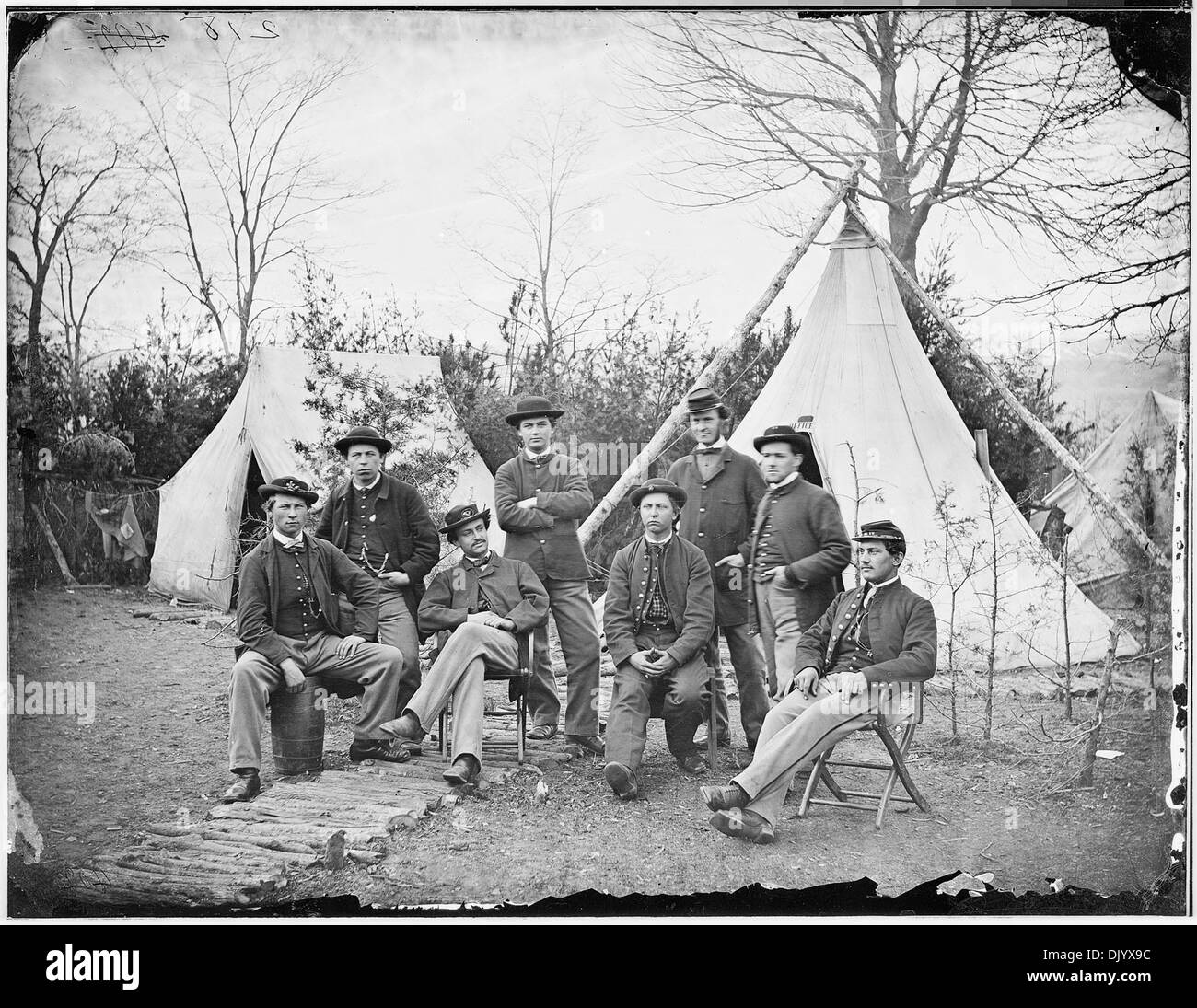 A camp scene captures the daily life and activities of individuals in a ...