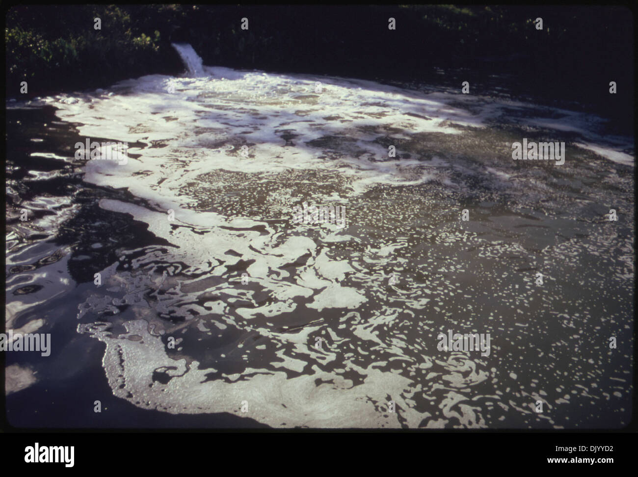 A closeup view of an outfall containing styrene, a chemical, emptying ...