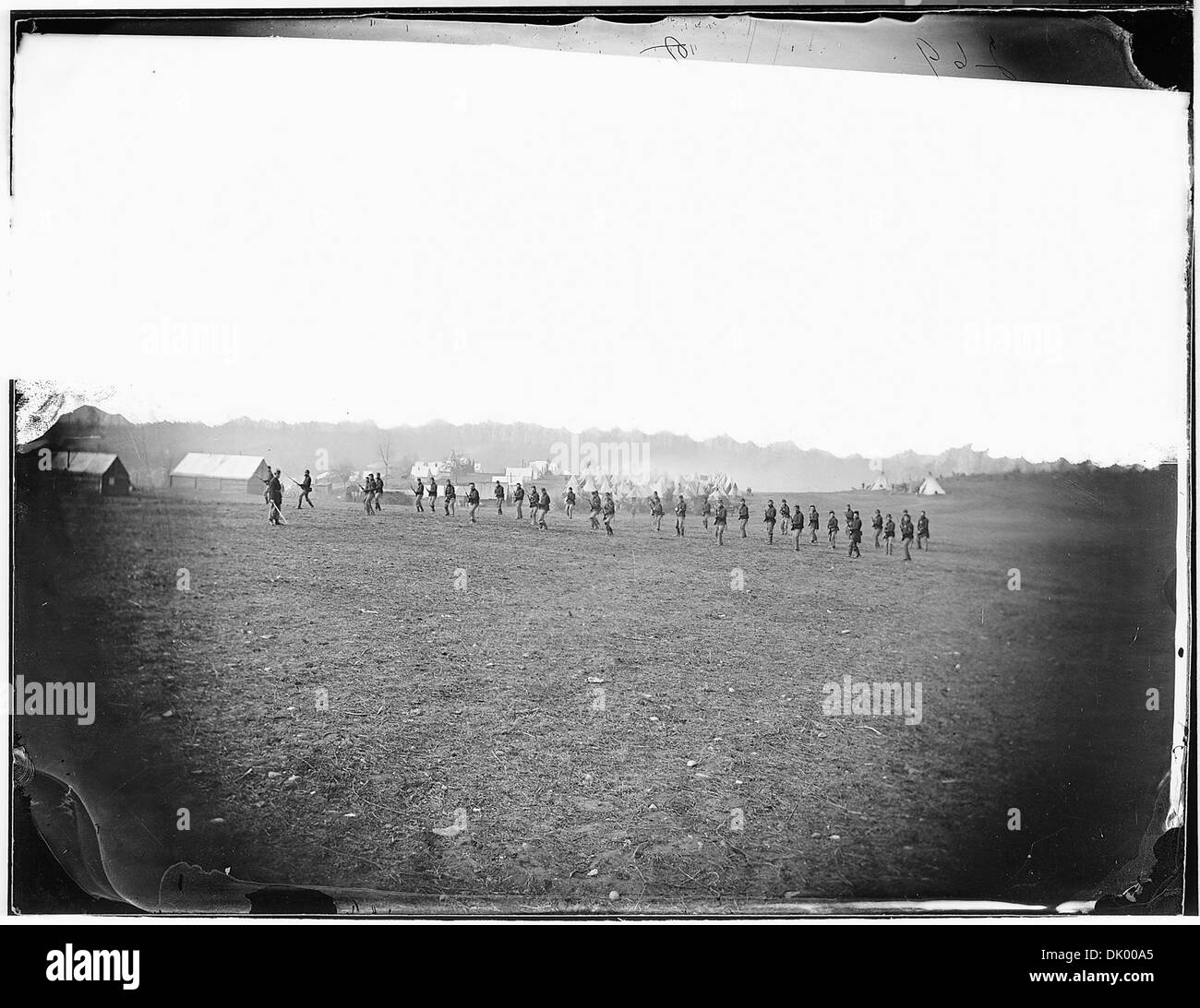 This image depicts a company of infantry soldiers engaged in military ...
