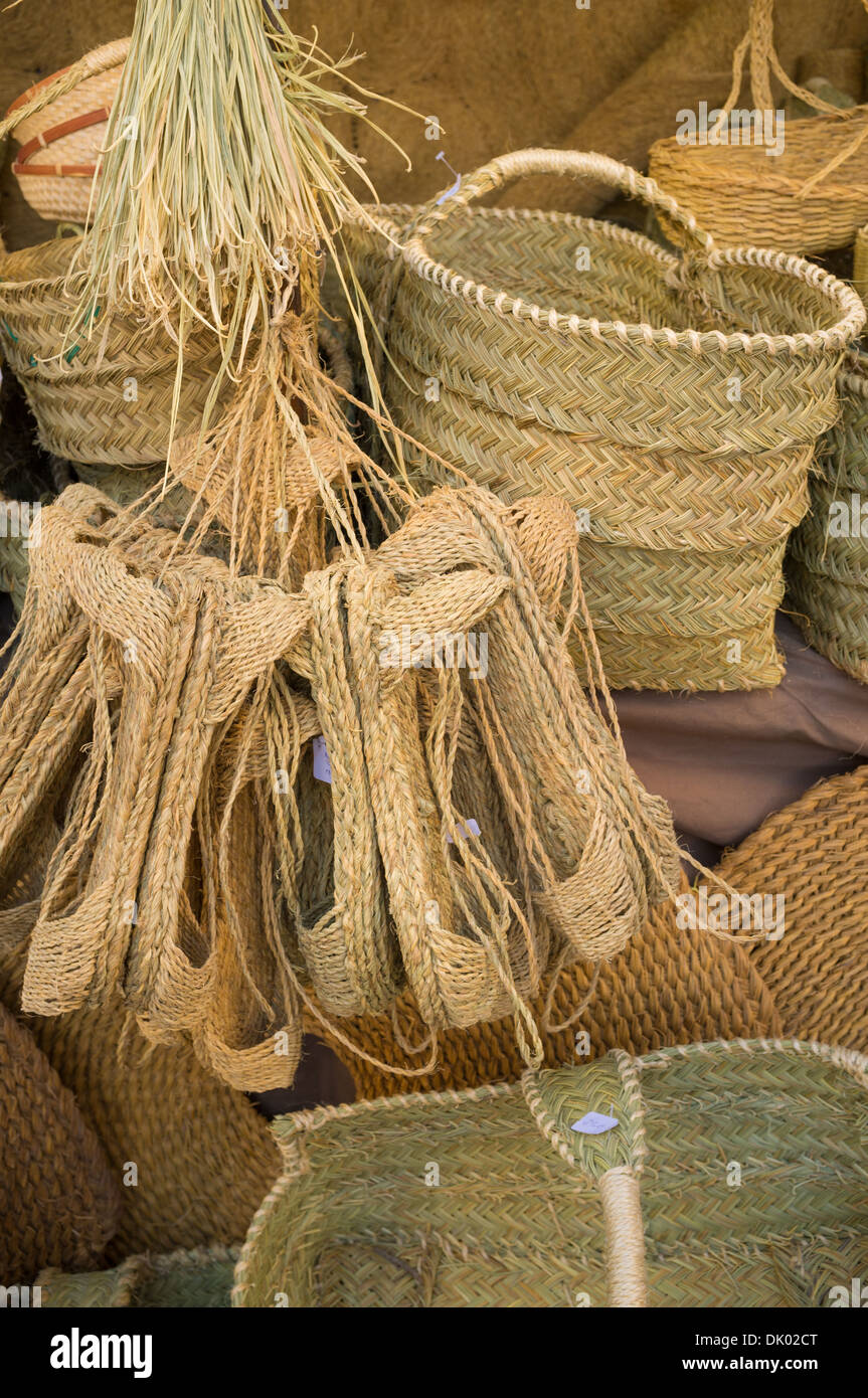 Assorted items of wickerwork on a market stall Stock Photo - Alamy