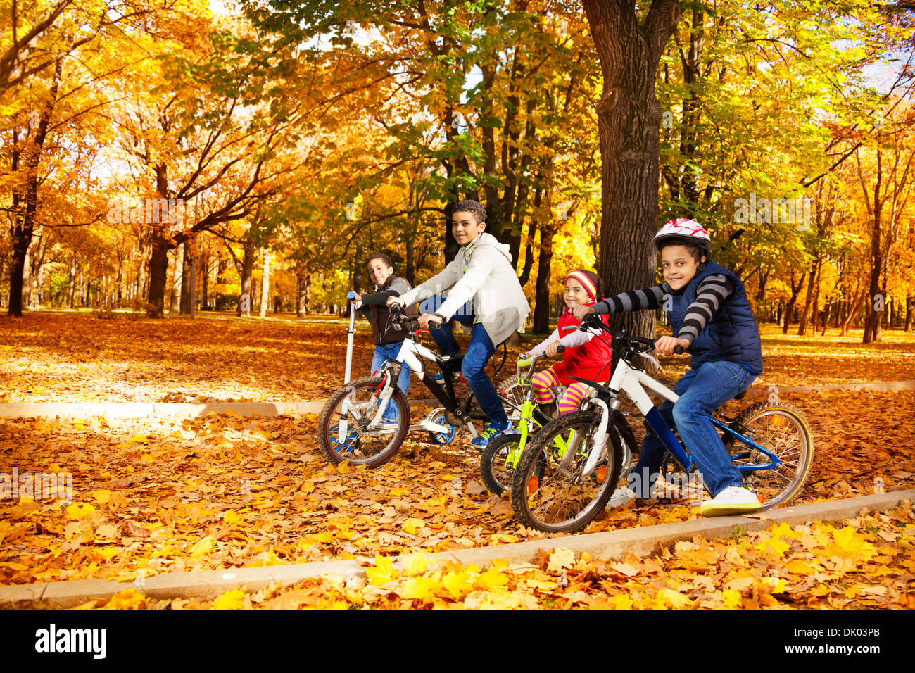 Children riding bicycles african hi-res stock photography and images ...