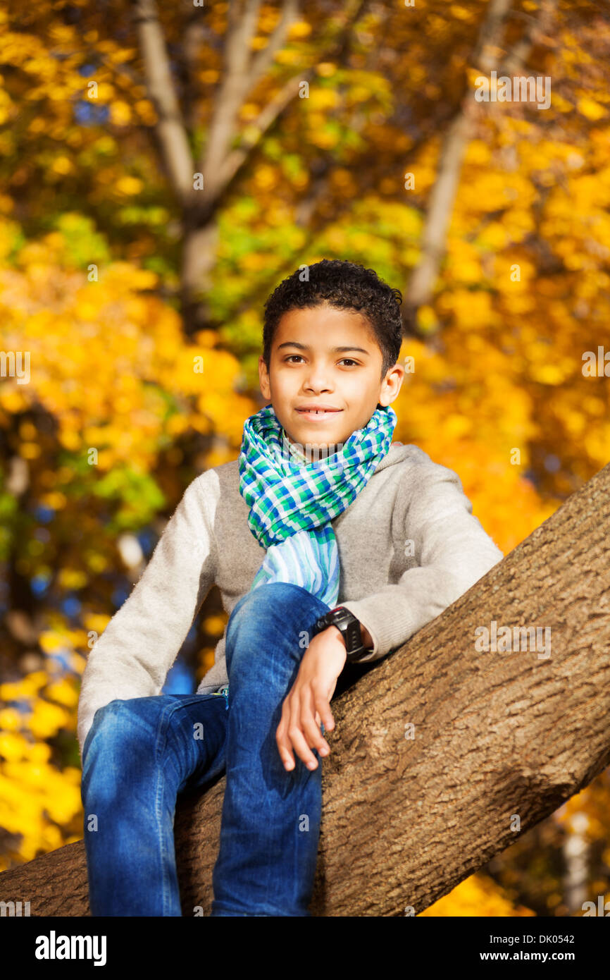 African boy climbing tree hi-res stock photography and images - Alamy