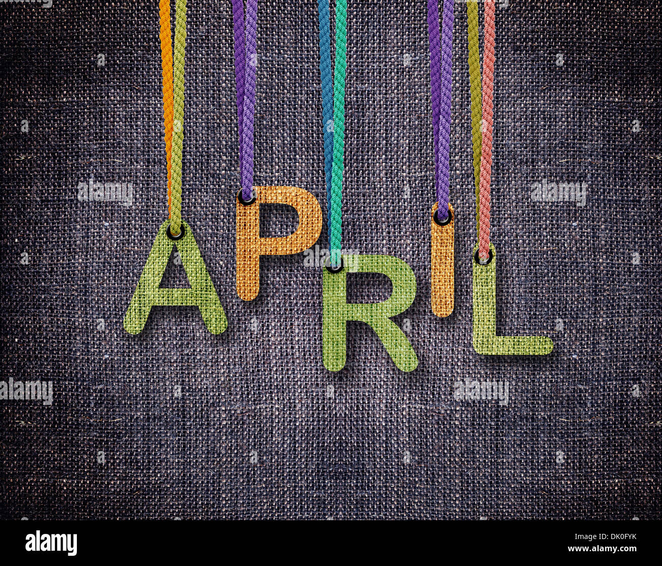 April letters hanging strings with blue sackcloth background Stock ...