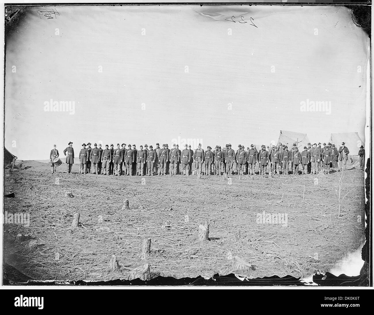 An infantry company stands at attention, demonstrating military ...