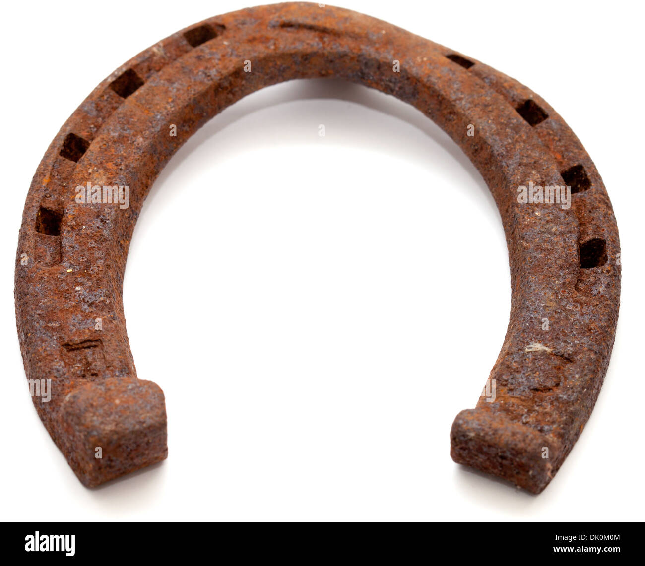 old rusty horseshoe isolated on white Stock Photo - Alamy