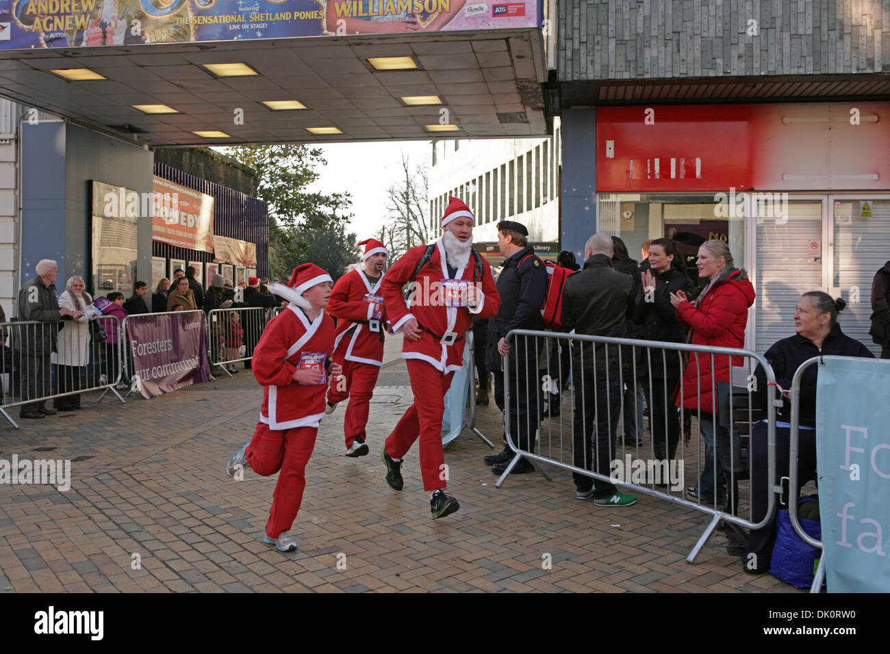 Bromley, UK. 1st Dec 2013. Santa Dash in Bromley High Street prior to ...