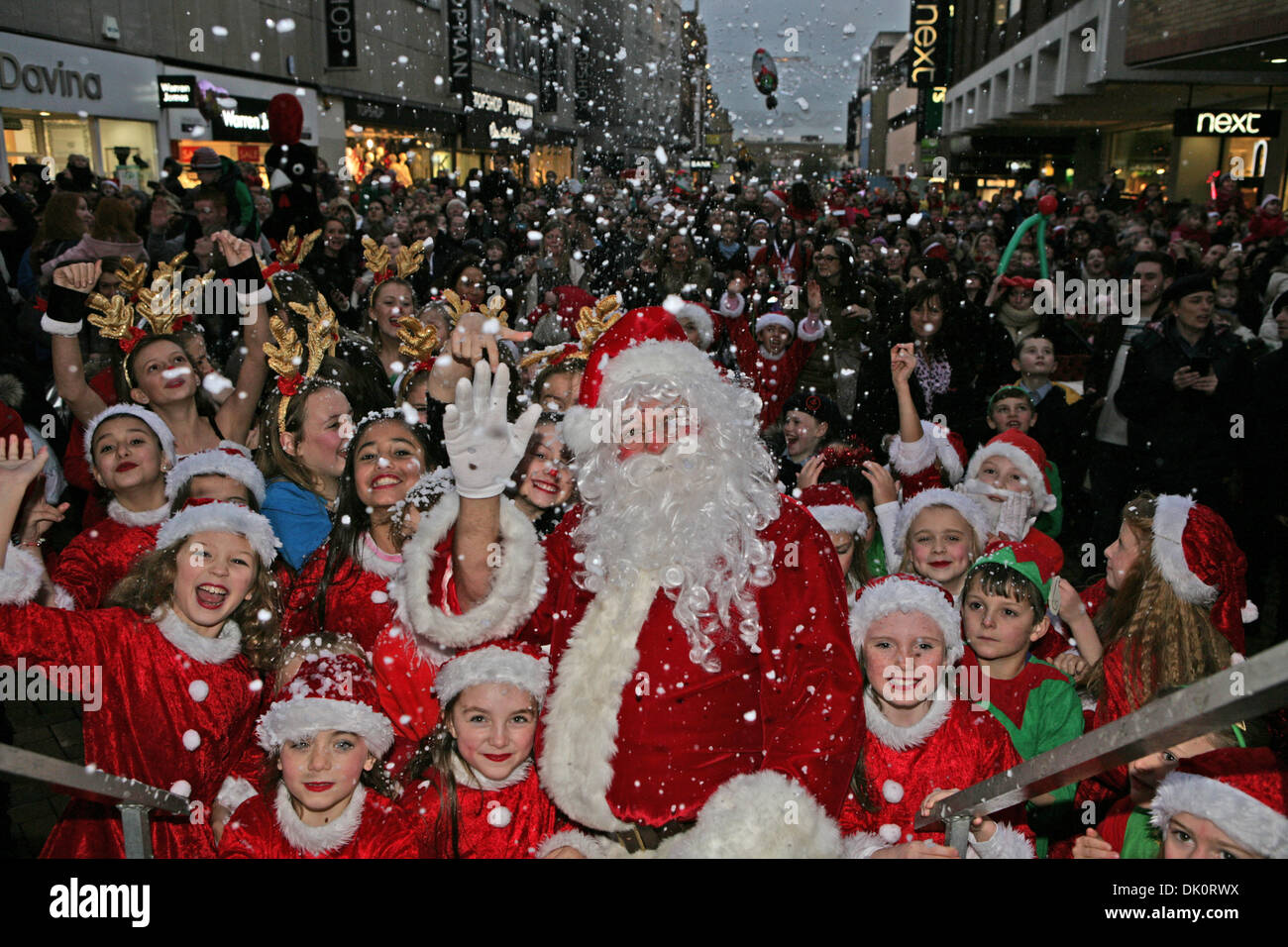 Bromley, UK. 1st Dec 2013. Santa with his helpers in the snow in ...