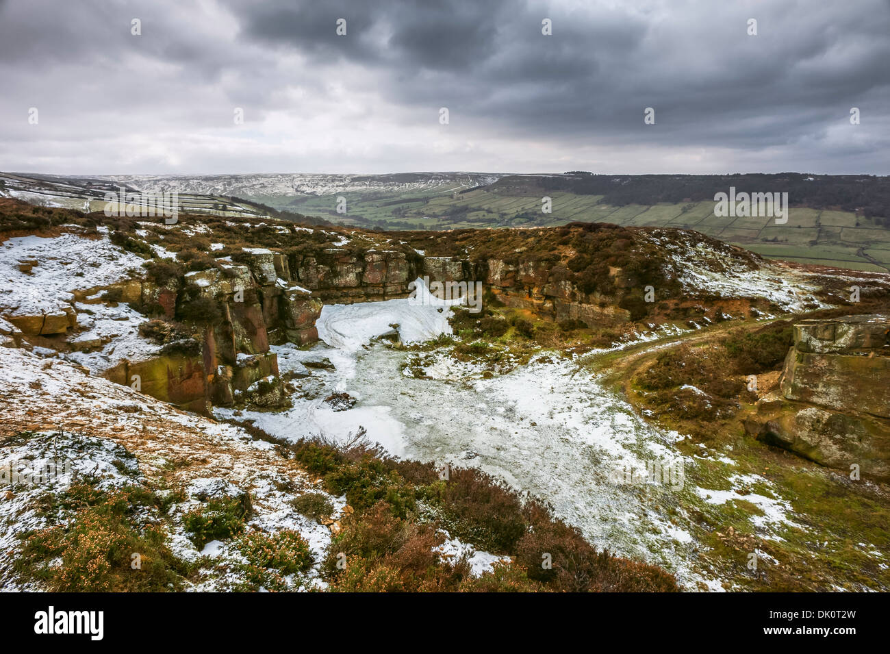 Snow over the north York Moors National Park showing a disused stone ...