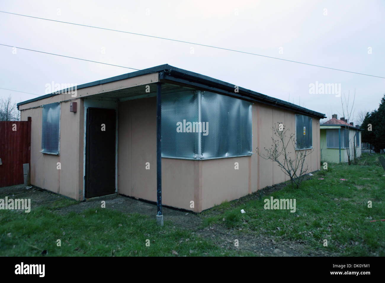 Boarded up post-war prefab on the Excalibur Estate, Caford, London ...
