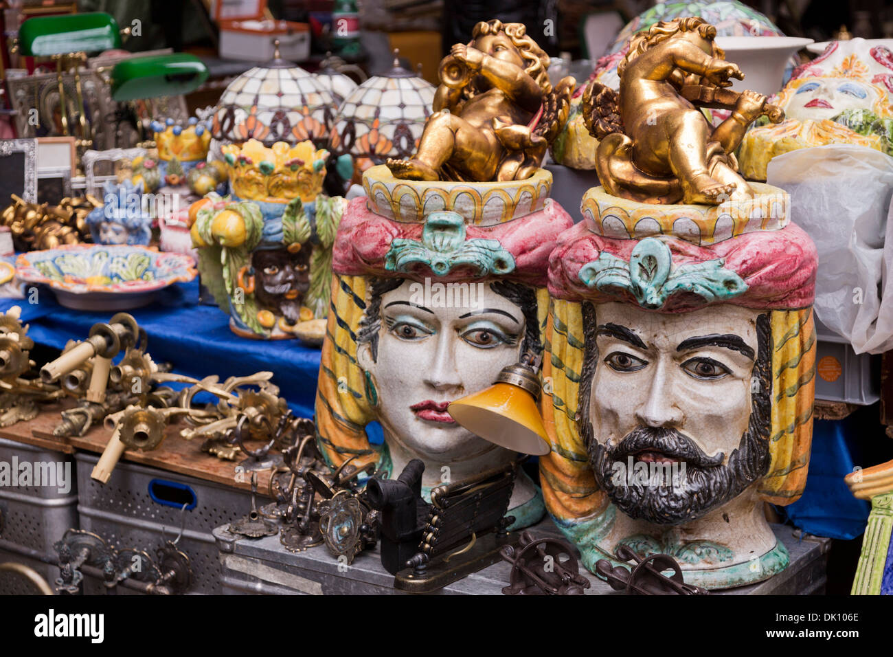 Large ceramic heads and bric-a-brac on sale at the Porta Portese, Via ...