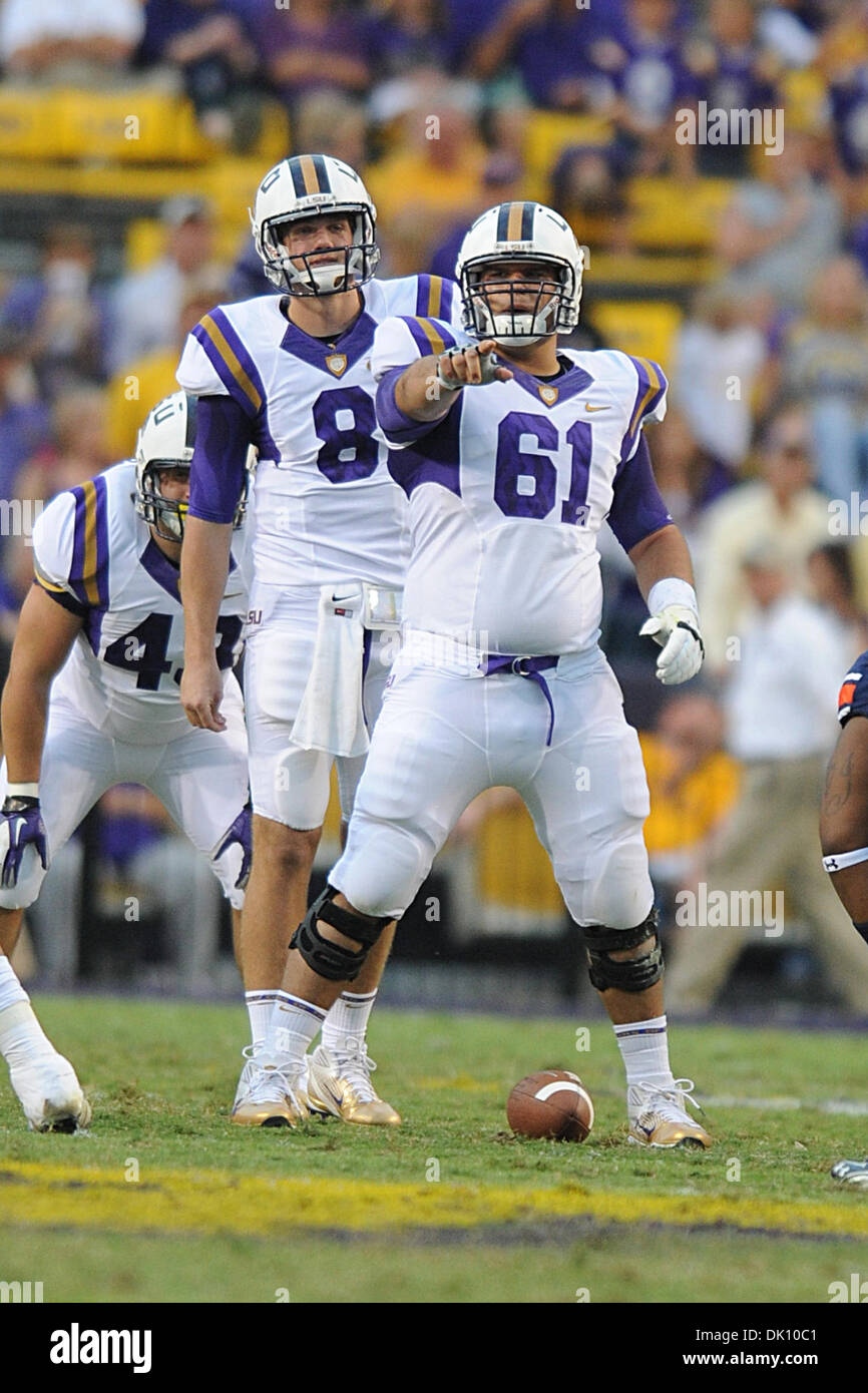 LSU Tigers center Ben Domingue (61) makes a call before a play during ...