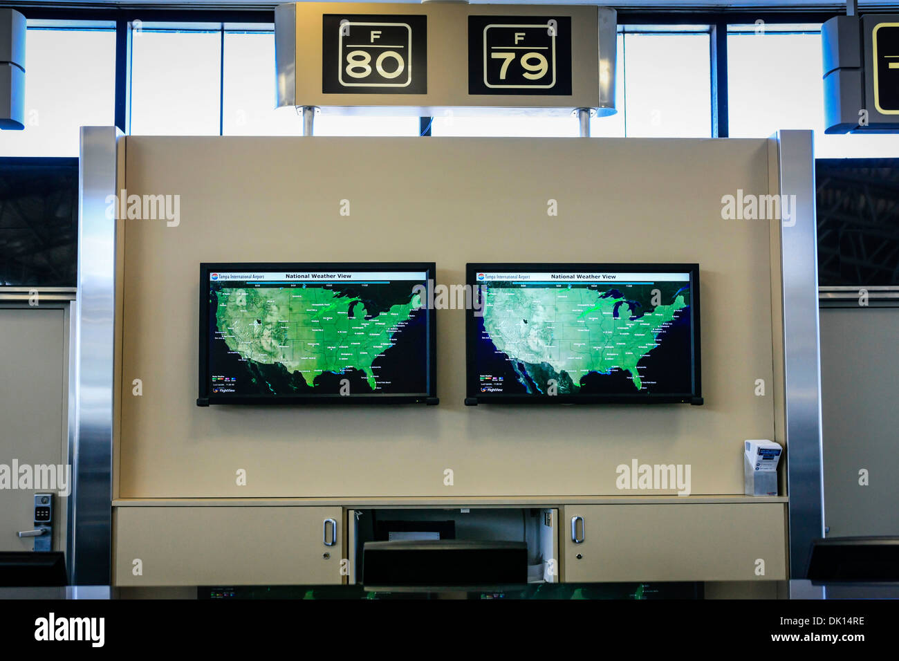 Tampa International Airport Gate 80 and 79 information desk Stock Photo ...