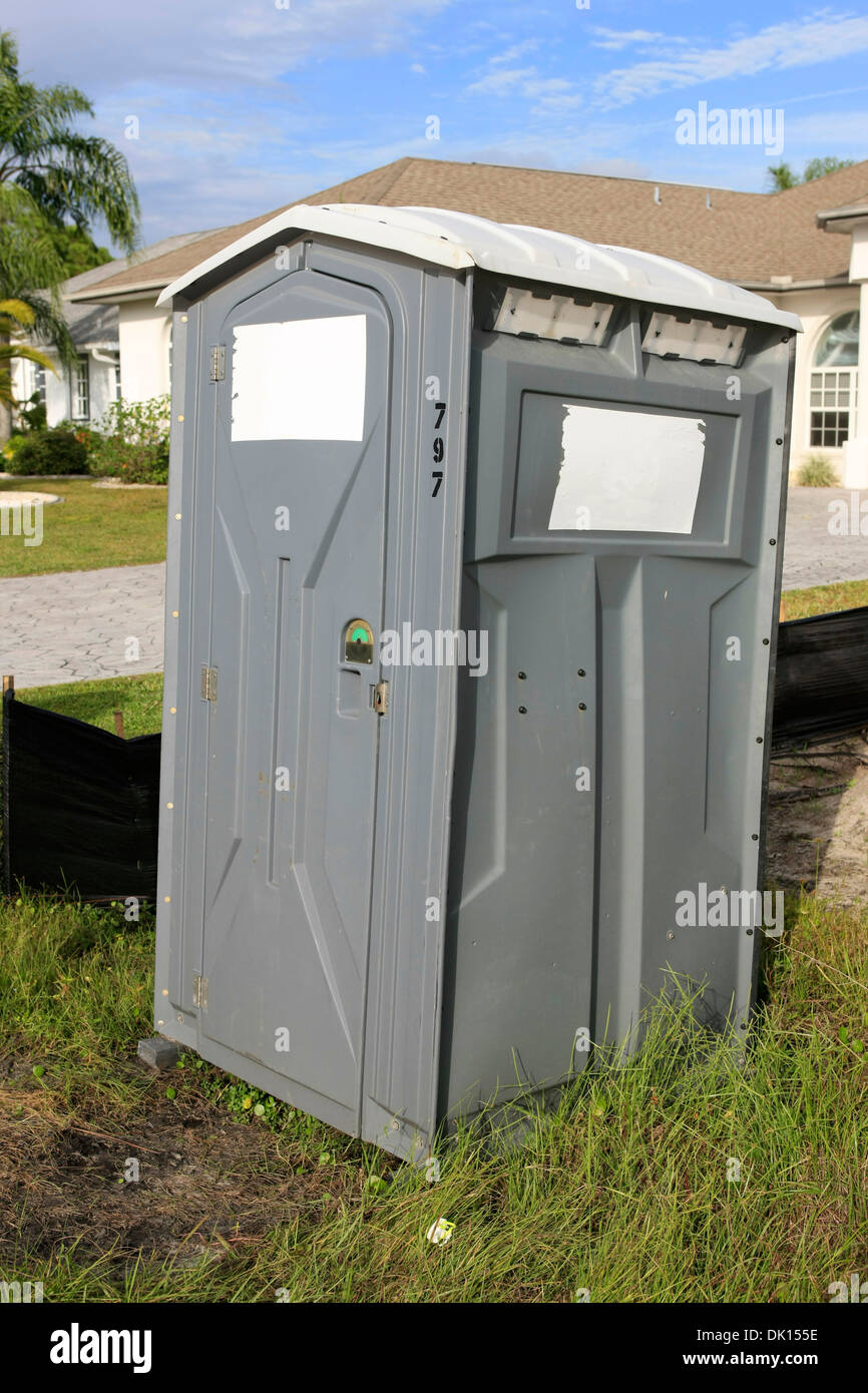 portable rest room on a residential house build lot Stock Photo - Alamy