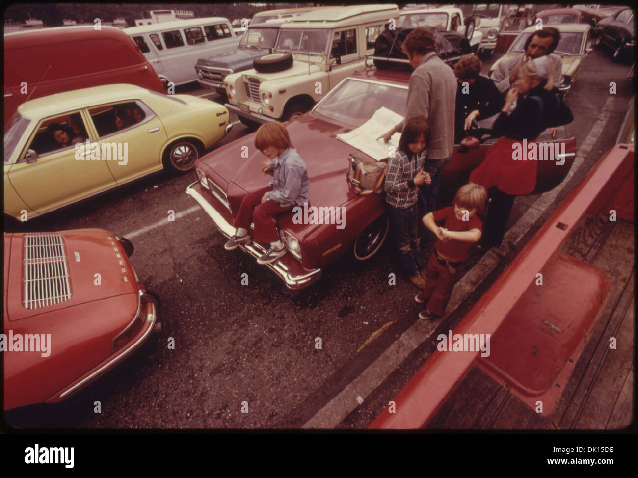 PEOPLE AND VEHICLES WAITING FOR THE FERRY AT THE BAINBRIDGE ISLAND ...