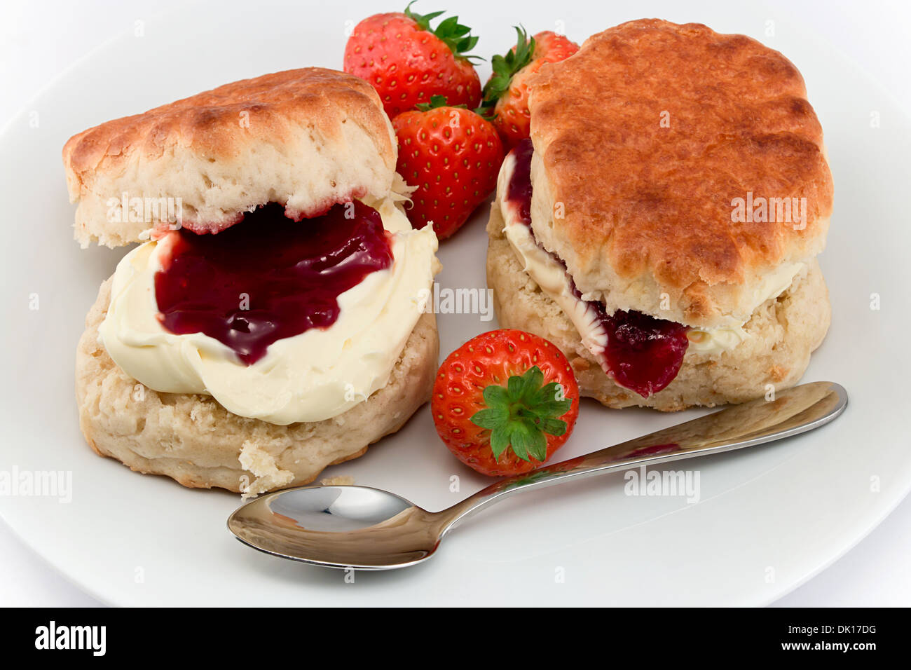 Traditional Afternoon Tea of Devonshire scones topped with clotted ...