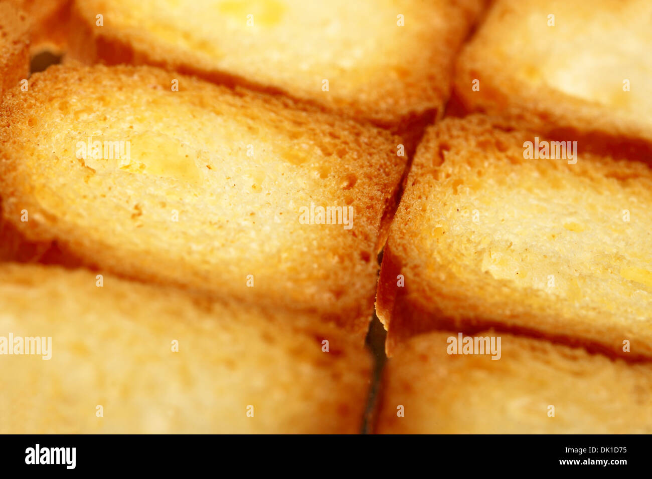 Many small dried rusks bread loaf toast biscuits as texture background ...