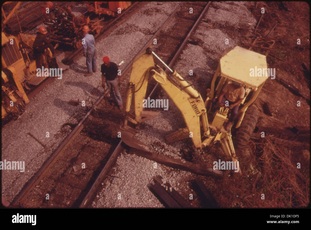 Southern Railway right-of-way crew is pictured using machinery to ...
