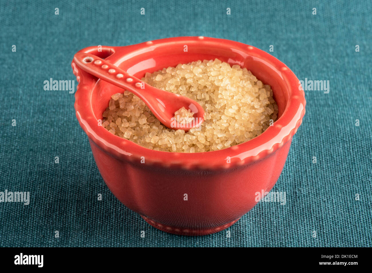 Small bowl of raw sugar Stock Photo - Alamy