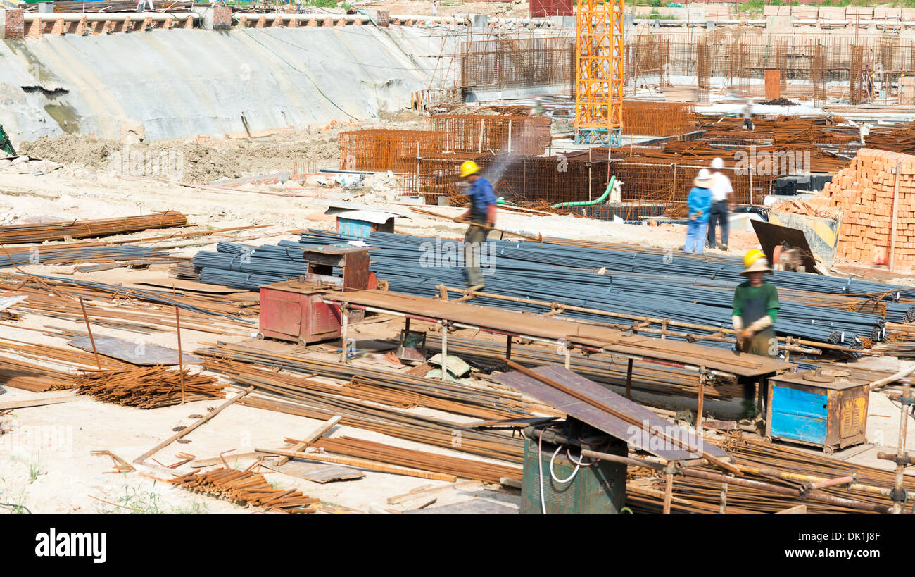 building under construction with workers Stock Photo - Alamy
