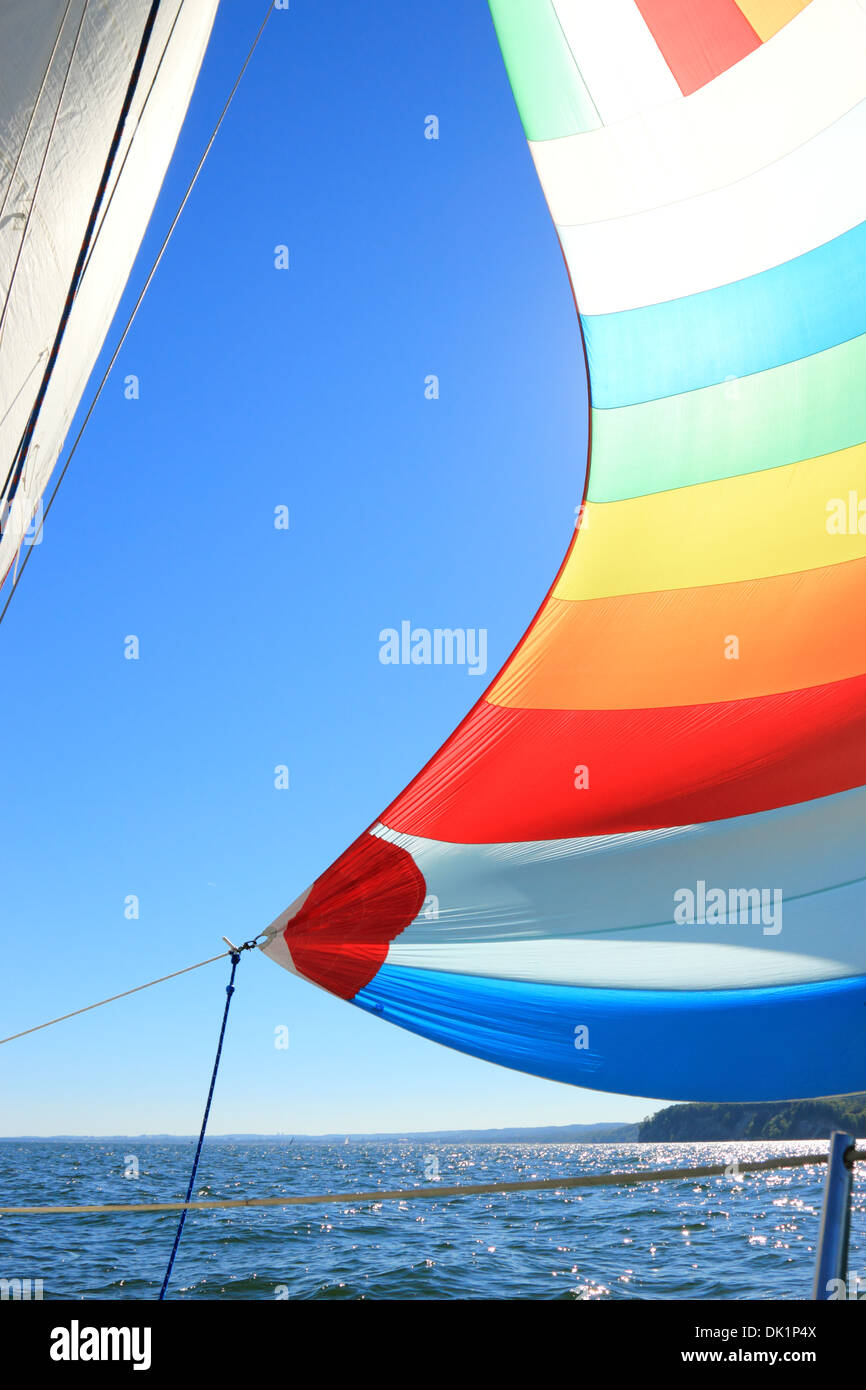 The wind has filled the spinnaker on sailing yacht. Detail of a ...