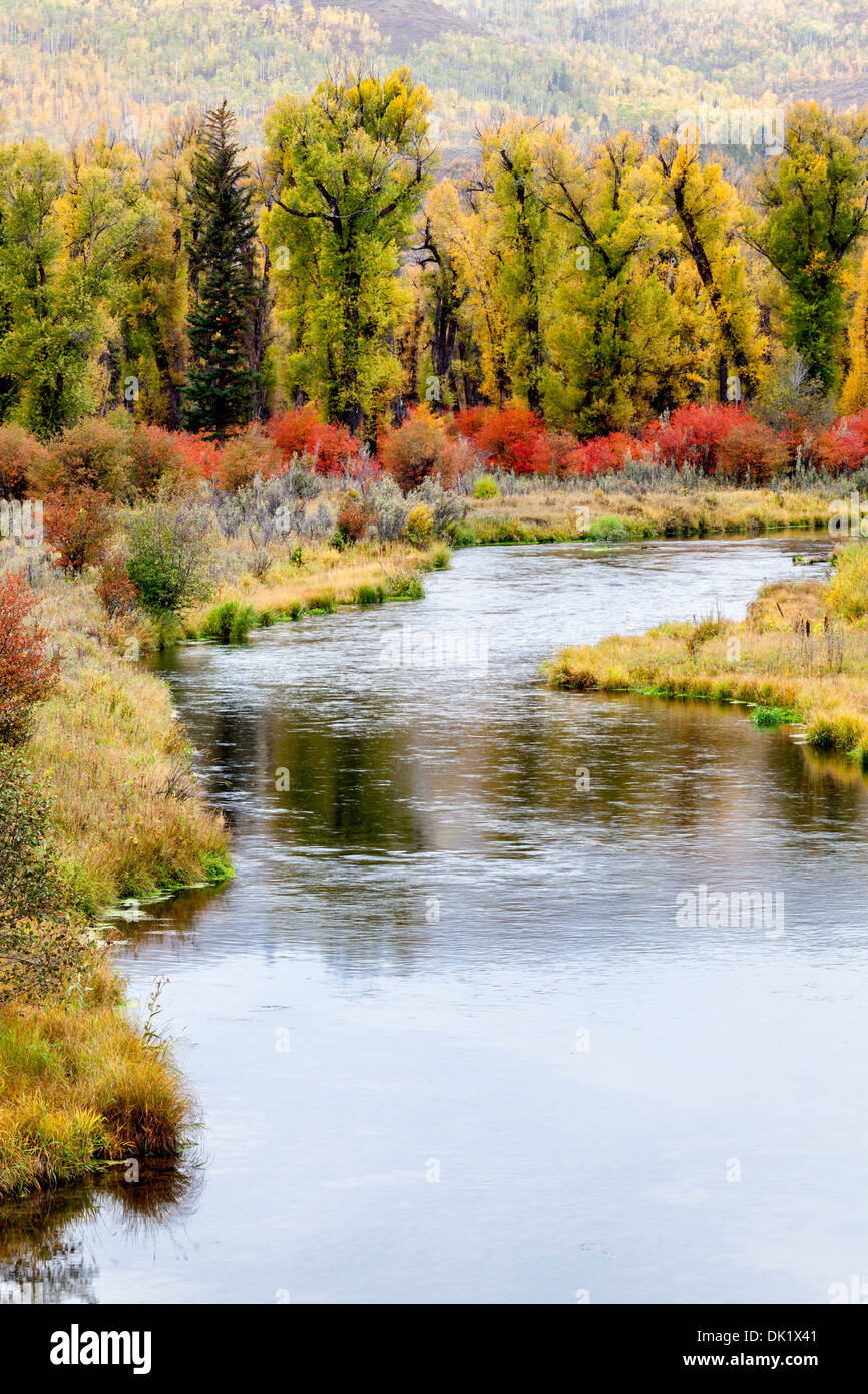 River during autumn color display Stock Photo - Alamy