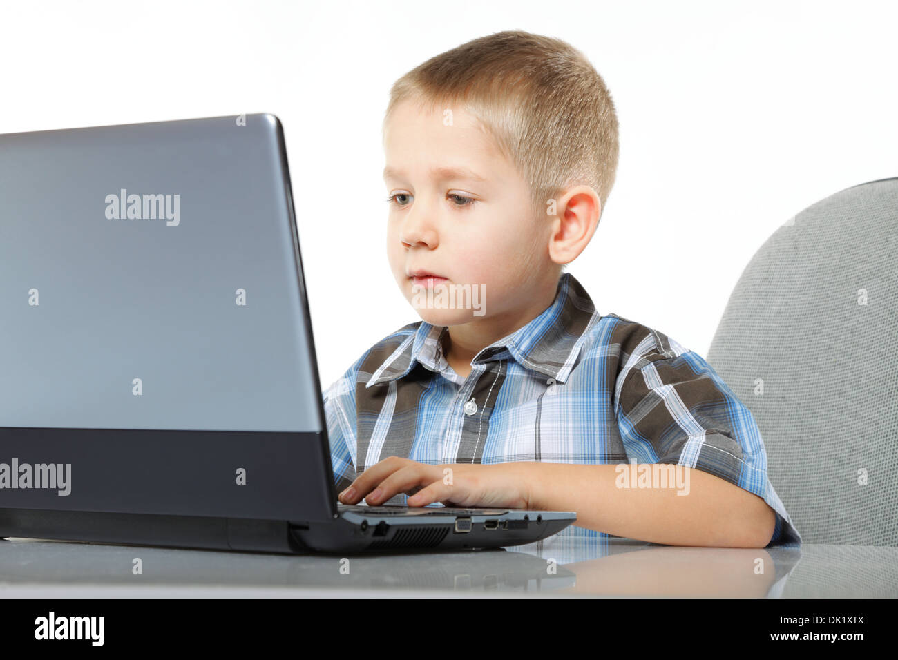 Computer addiction child boy with laptop notebook white background ...
