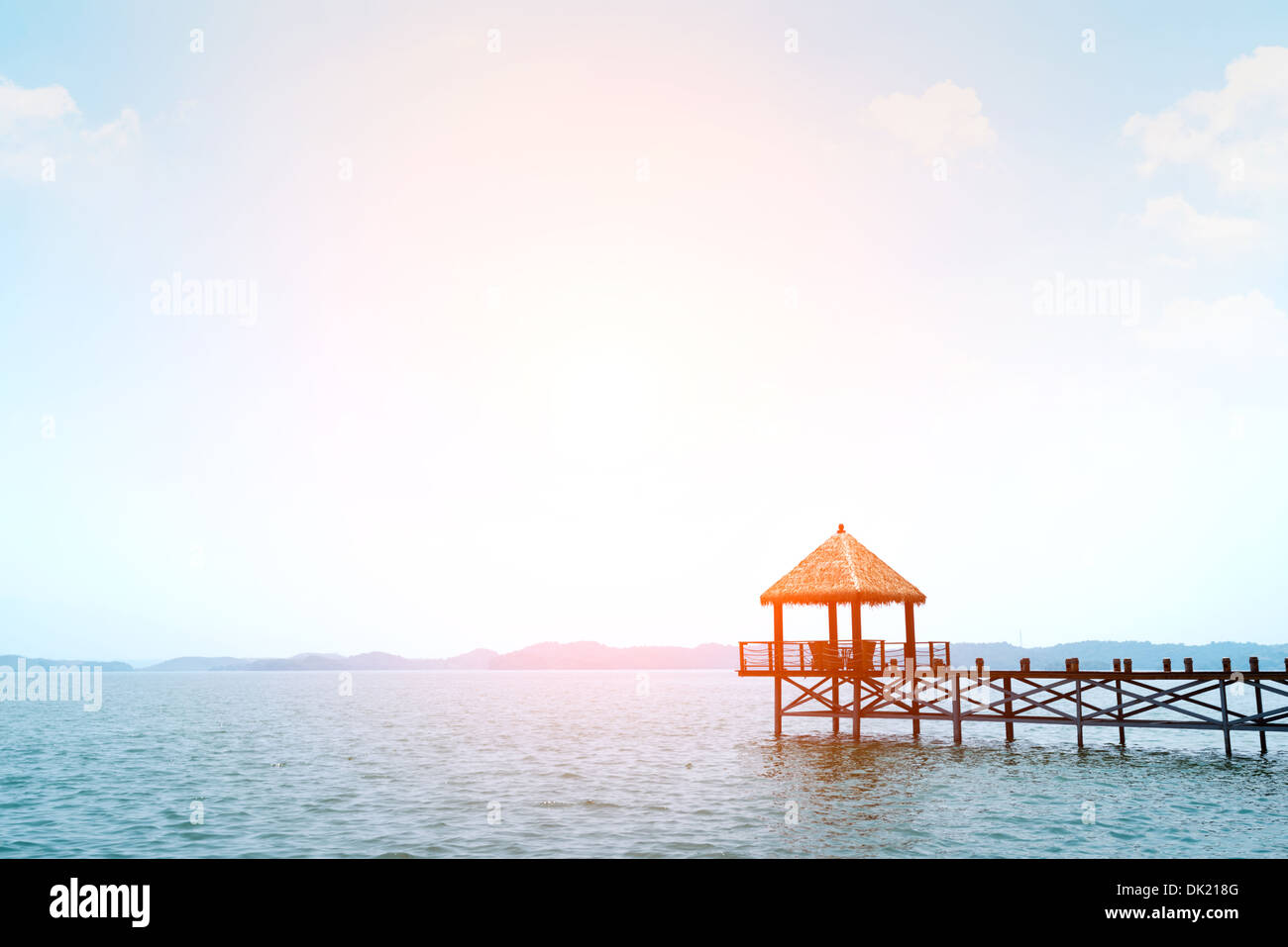 Wooden jetty over the beautiful Maldivian sea with blue sky Stock Photo ...