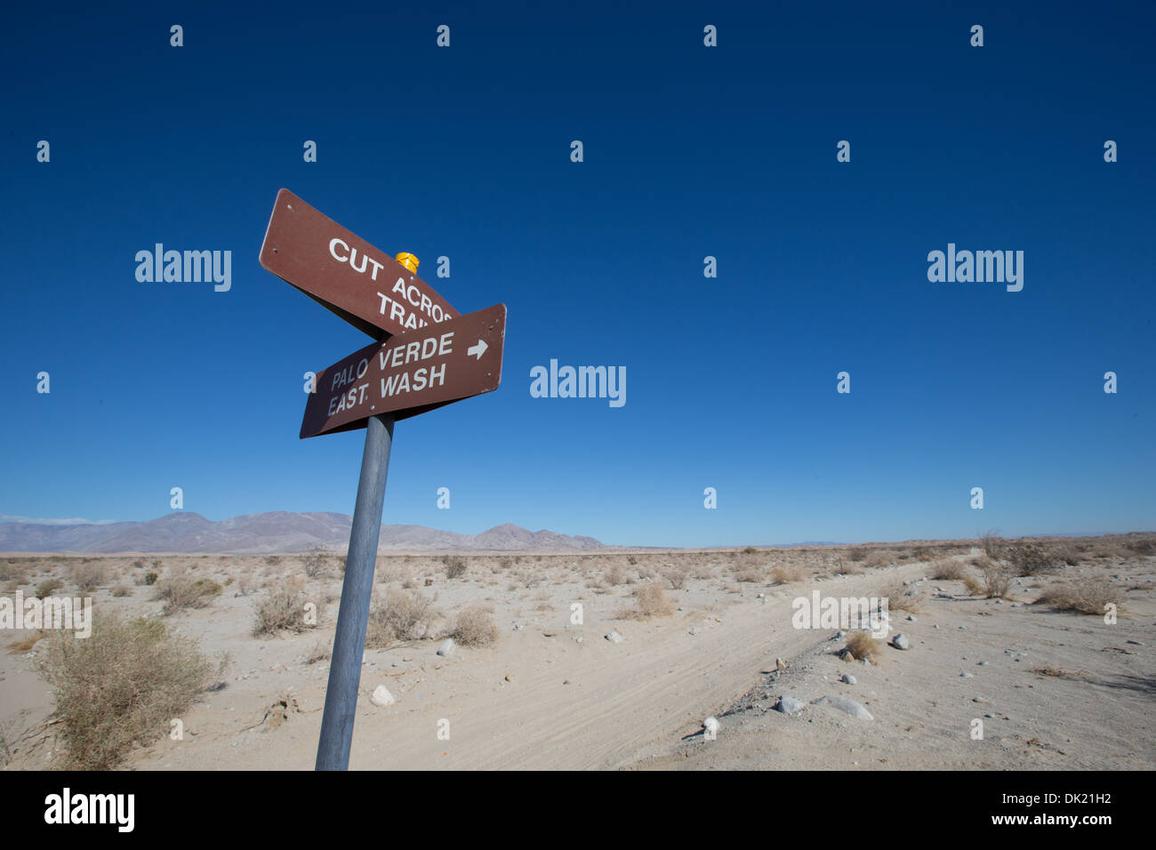 A signpost marks the intersection of Cut Across Trail and Palo Verde ...