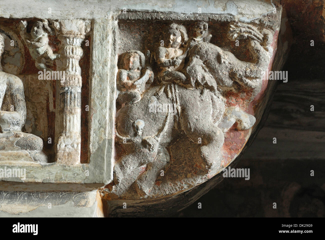 Cave 19 : Pillar capital detail. Elephant and riders on one side of the ...
