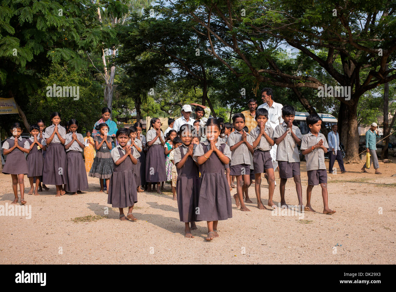 Rural Indian school children chanting vedas at Sri Sathya Sai Baba ...